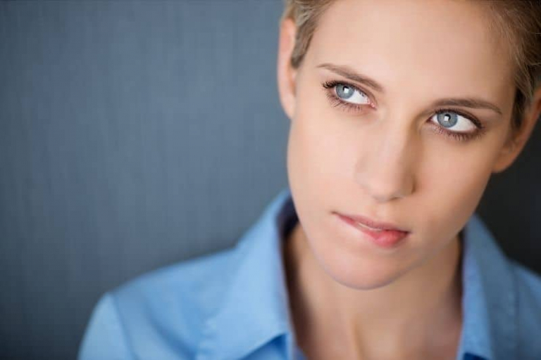Girl Biting Lip: 10 Secret Meanings Behind This Playful Gesture