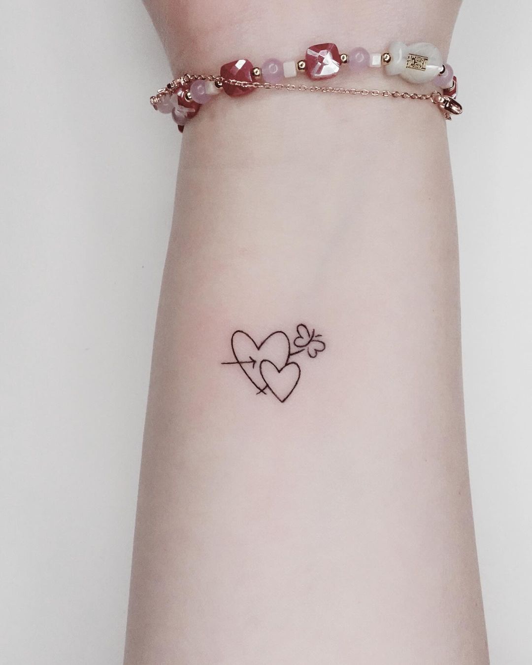 27 Incredibly Cute Micro Heart Tattoos That Will Make You Melt