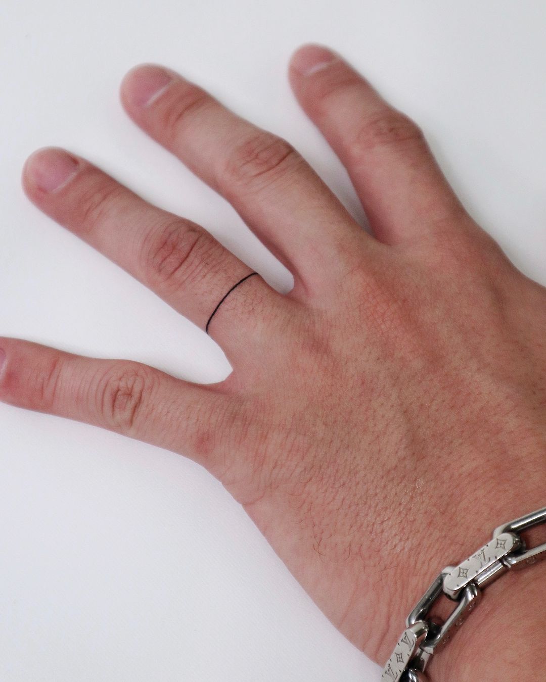 26 Fabulous Wedding Ring Tattoos That Show You Believe In Love Forever