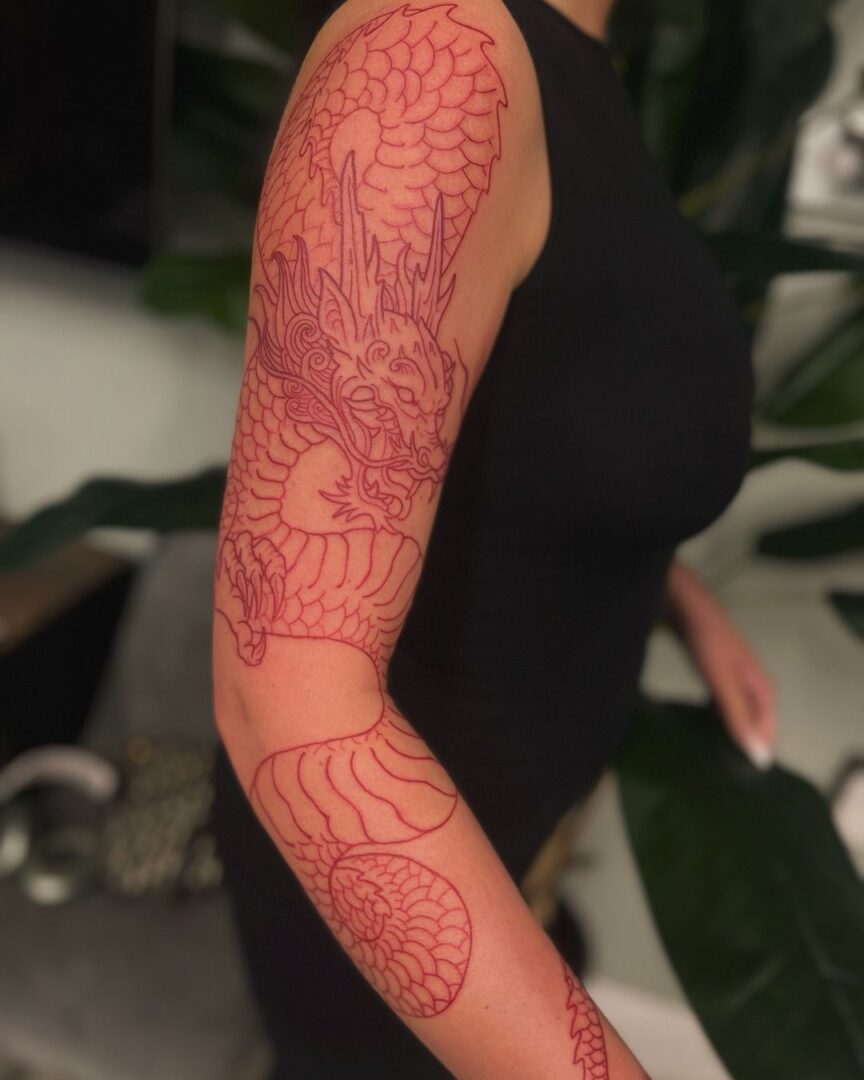 22 Bold Red Sleeve Tattoos That Are A Must See