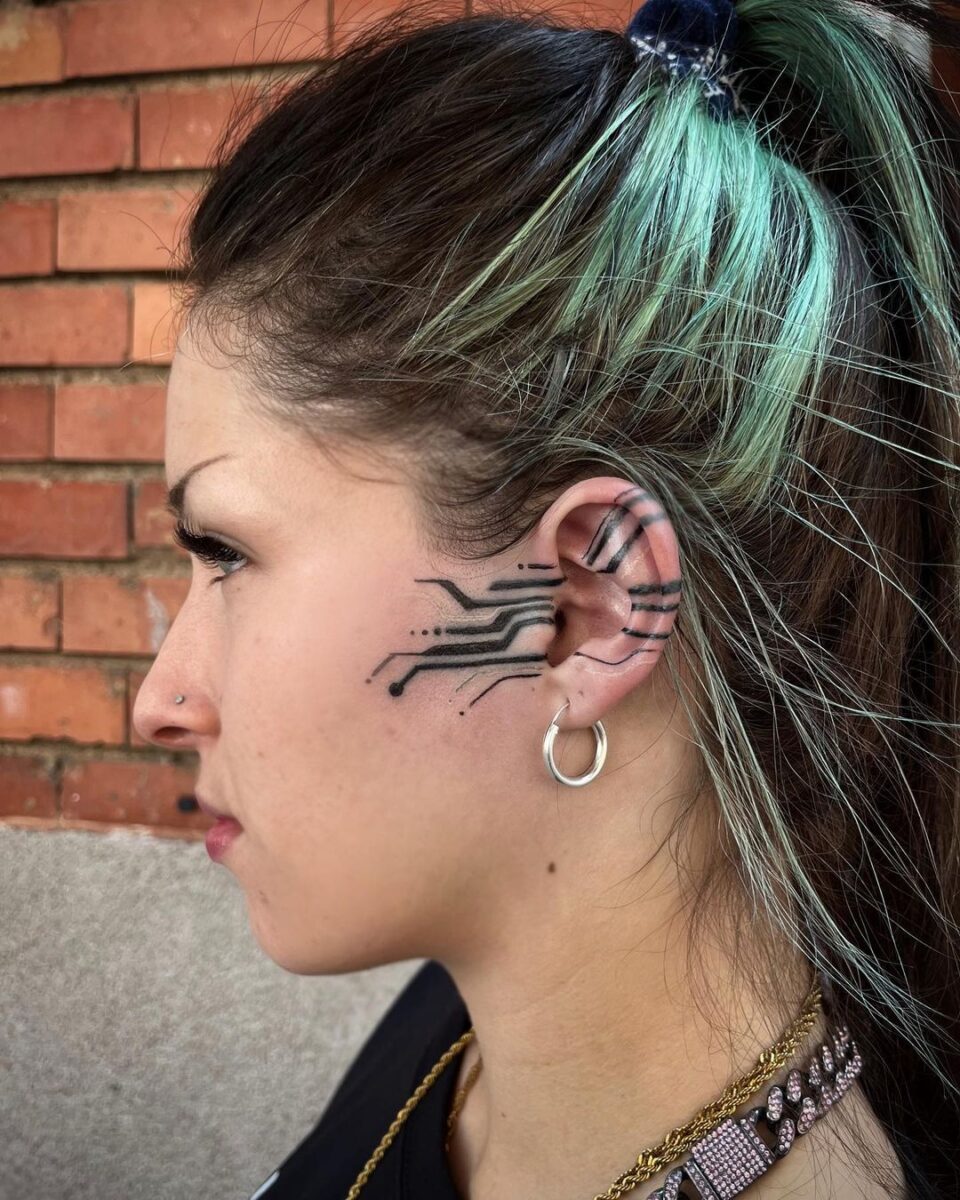 24 Futuristic Cyberpunk Tattoos That Capture The High Tech, Low Life Vibe