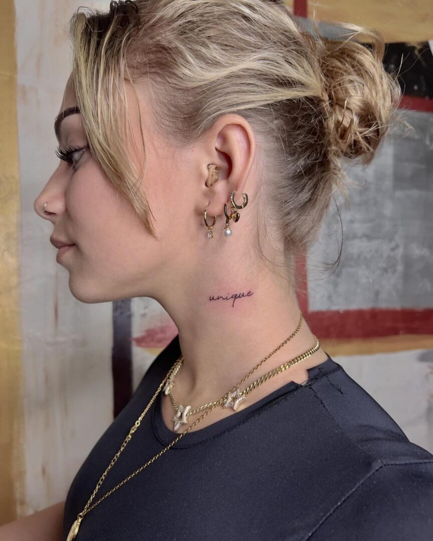 24 Incredible And Meaningful Cursive Neck Tattoo Ideas – The Weekender Pk