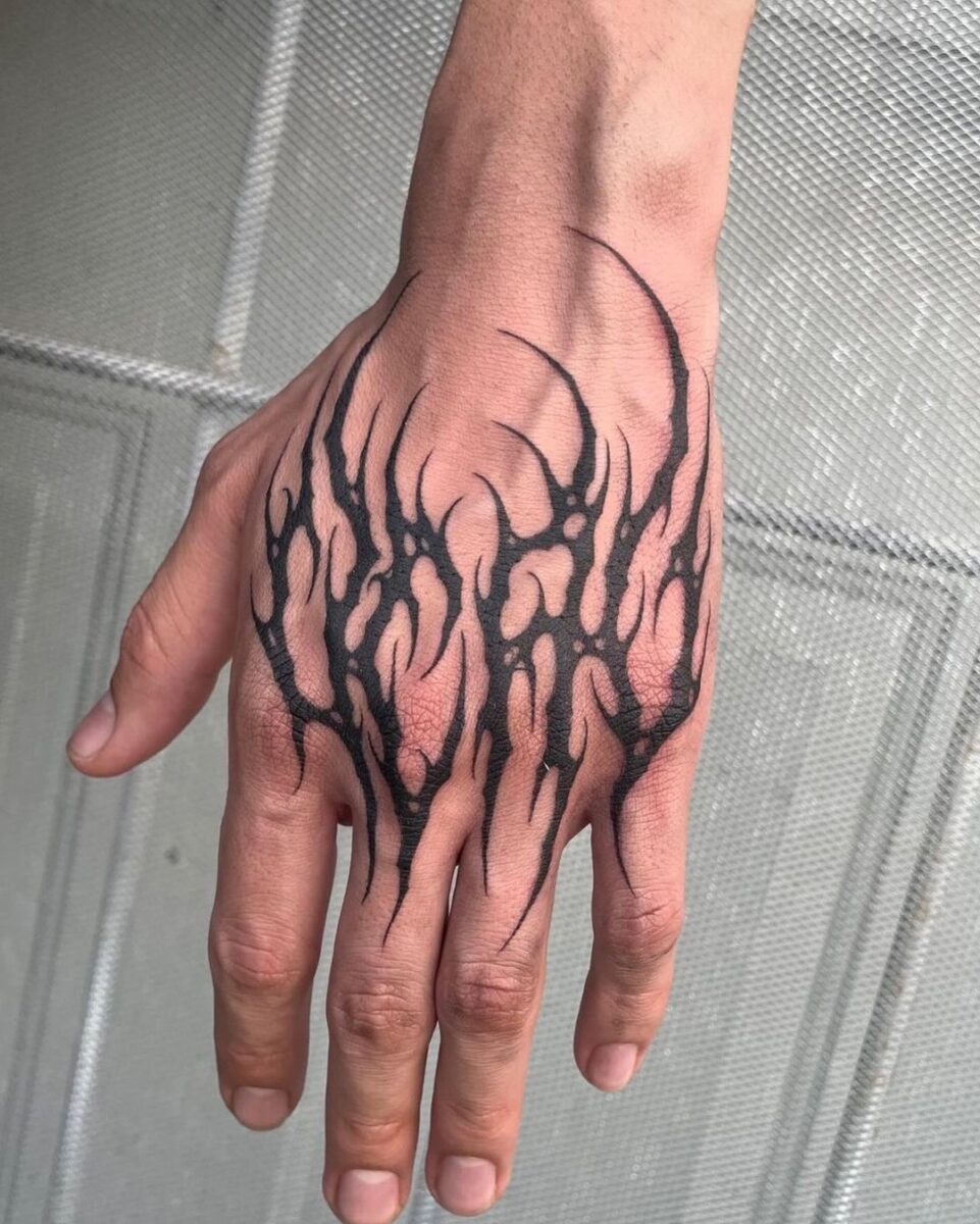 12 Powerful Hand Tattoos For Men You'll Want On Yourself