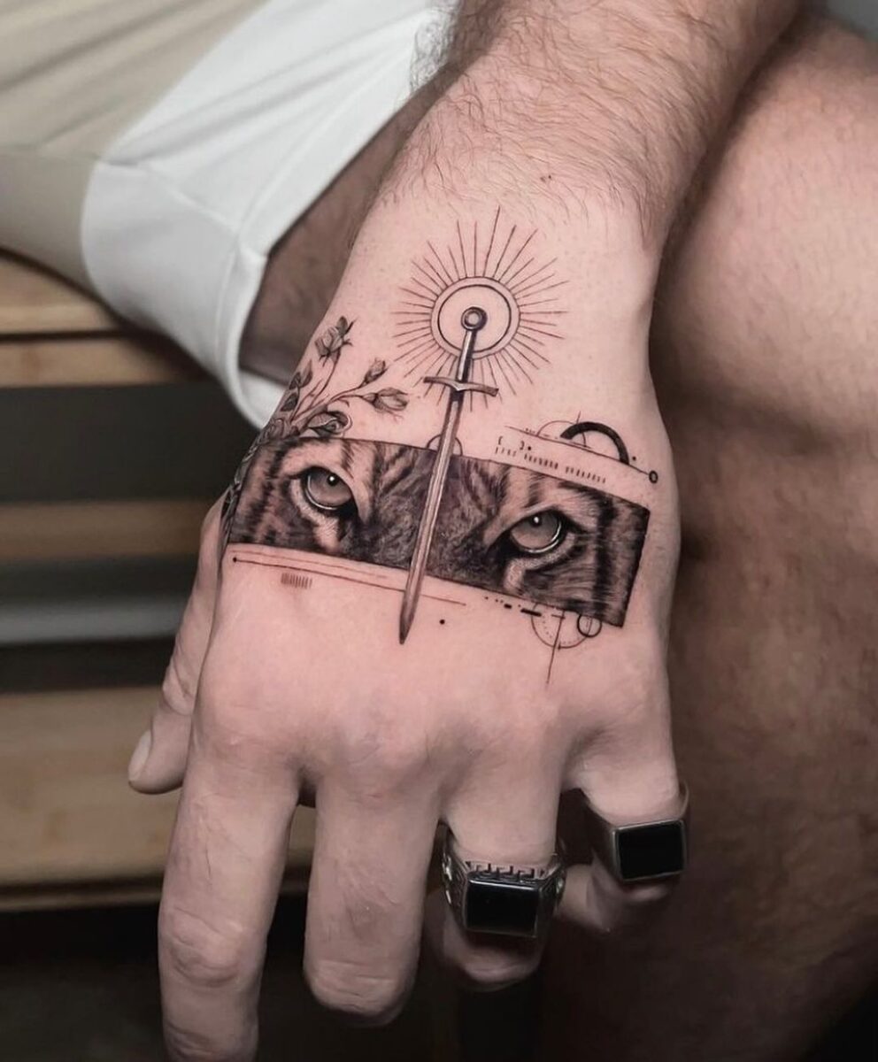 12 Powerful Hand Tattoos For Men You'll Want On Yourself