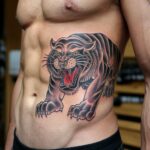 11 Striking And Cool Rib Tattoos For Men – The Weekender Pk