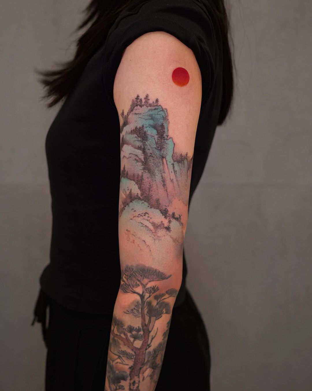 15 Creative & Meaningful Arm Tattoos For Women