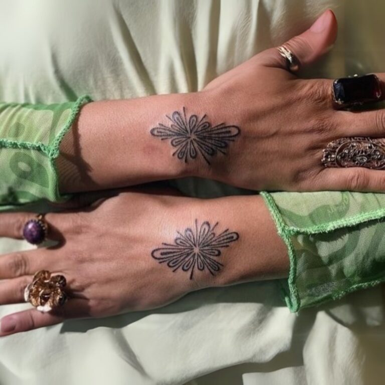 14 Stylish And Girly Hand Tattoos You'll Want To Ink Next