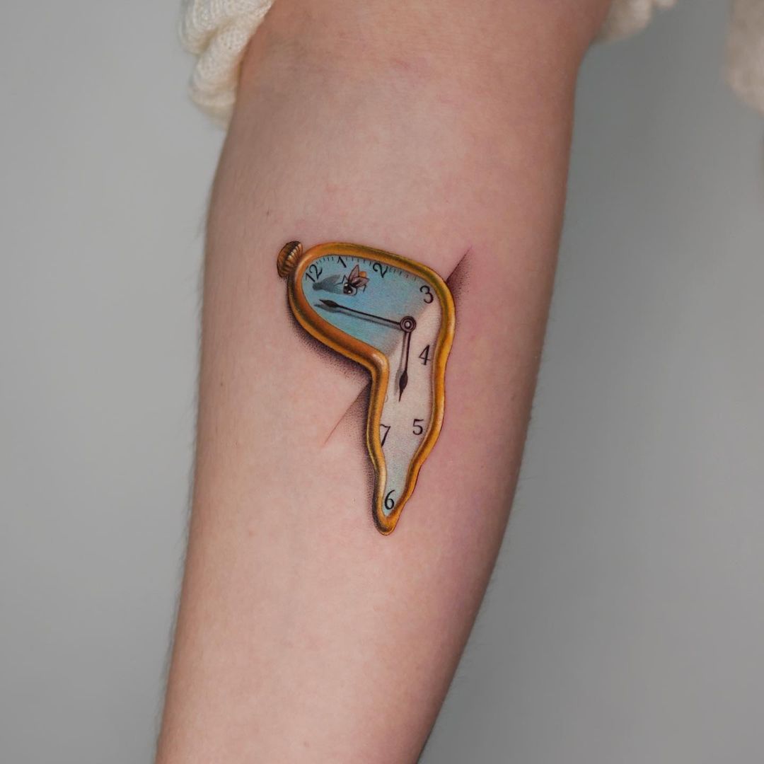 15 Intriguing Surrealism Tattoos That'll Twist Your Mind