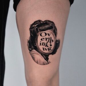 15 Intriguing Surrealism Tattoos That'll Twist Your Mind