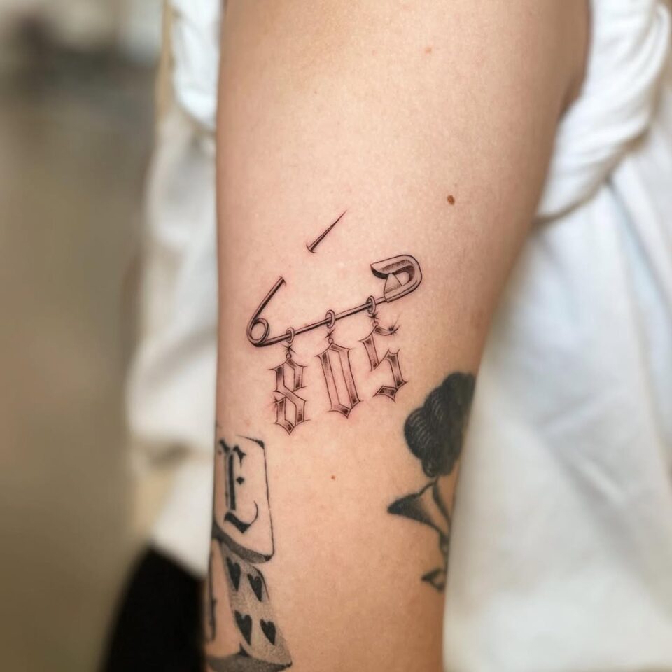 15 Bold And Edgy Safety Pin Tattoos For Rebellious Souls