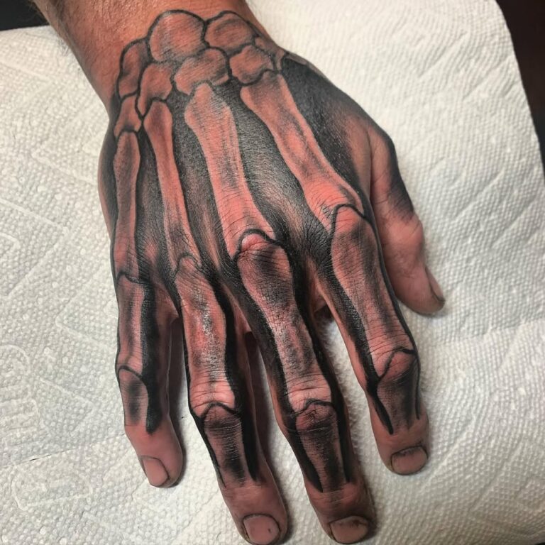 13 Eerie Bone Hand Tattoos That Will Give You Goosebumps