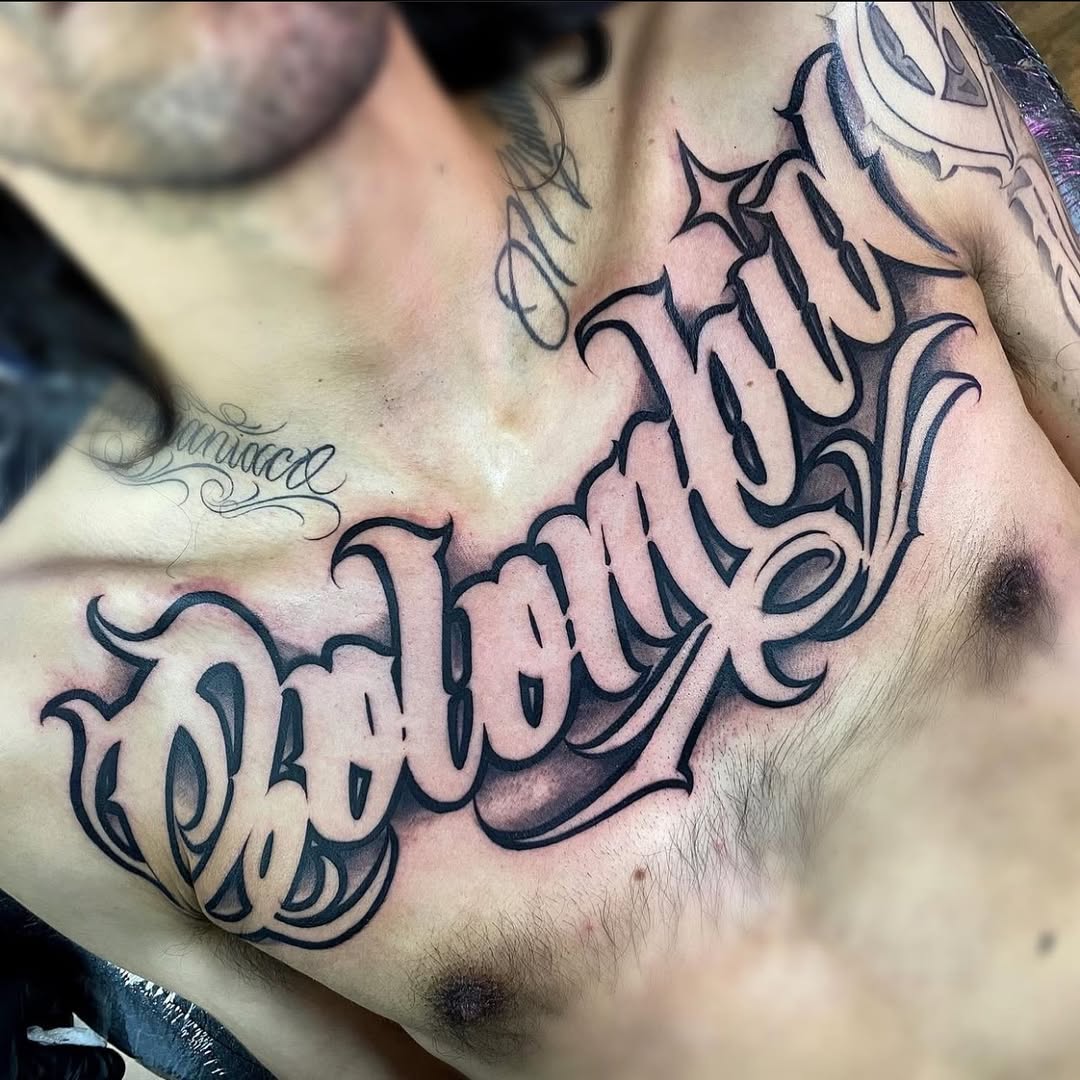 13 Bold And Cool Chest Tattoo Lettering Designs You'll Want To Get ...