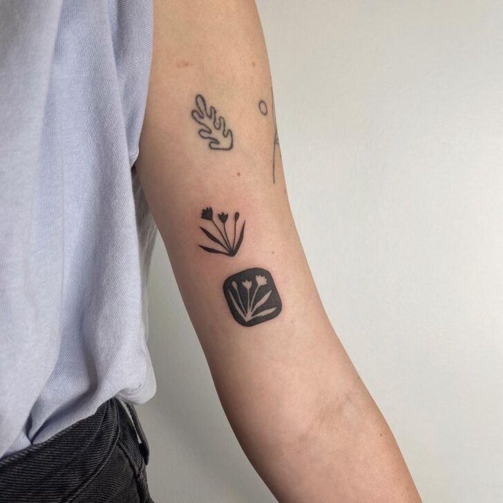 14 Incredible Negative Space Tattoos That Use The Emptiness To Create ...