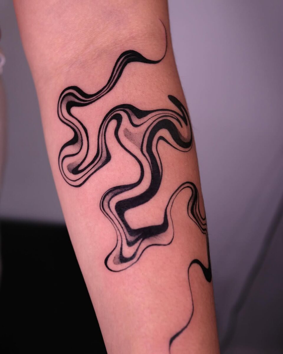 15 Artsy And Elegant Flow Tattoos Every Woman Will Love